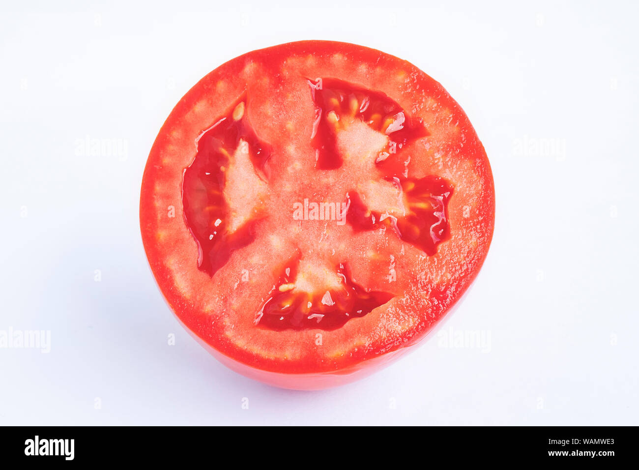 Tomato slice isolated on white background, top view Stock Photo - Alamy