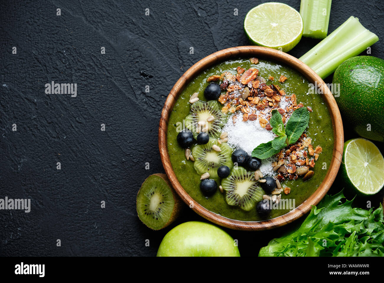 Smoothie bowls. Healthy breakfast bowl with chia seeds, muesli, berries ...
