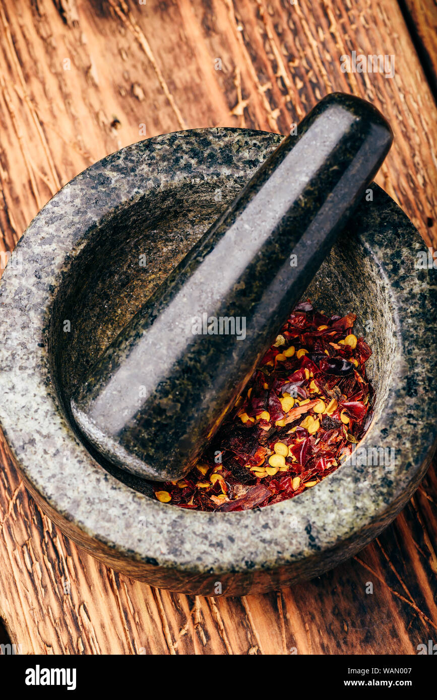 Grinding chili pepper in stone hi-res stock photography and images - Alamy