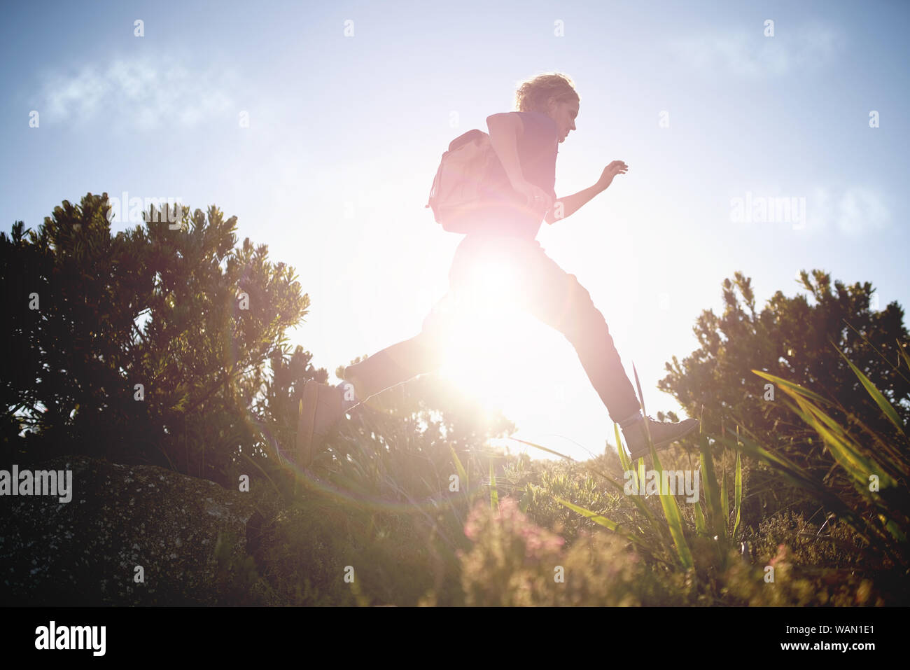 Running with backpack outdoor hi-res stock photography and images - Alamy