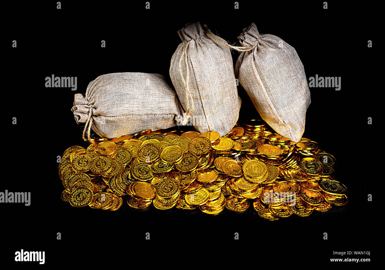 Stacking gold coin in treasure stack at black background Stock Photo ...