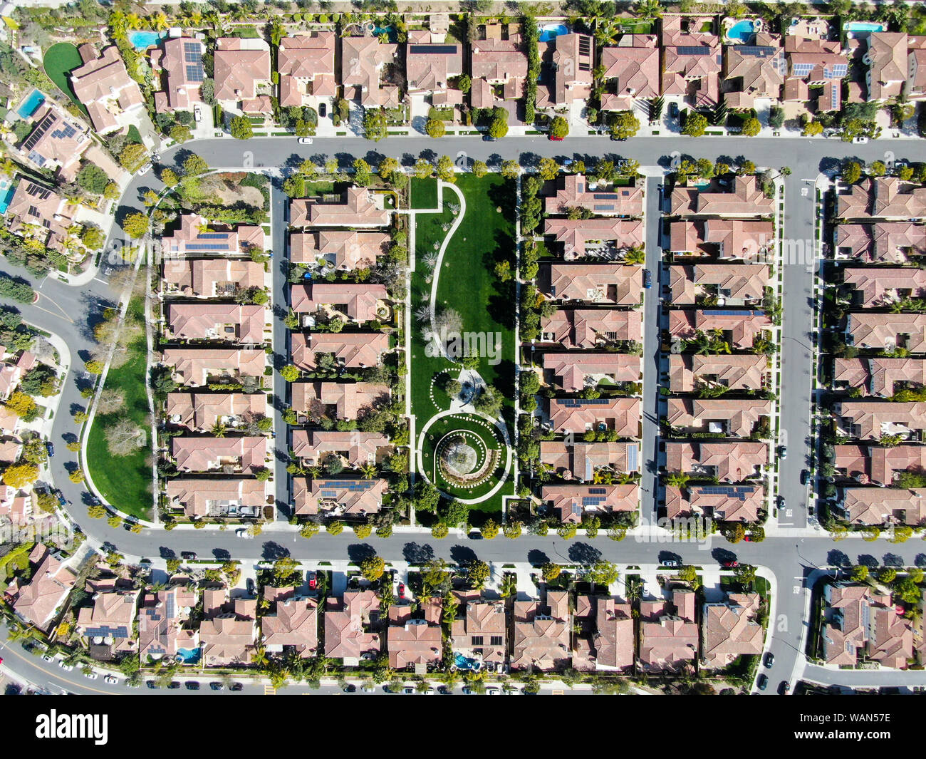 Aerial view suburban neighborhood with identical wealthy villas next to ...