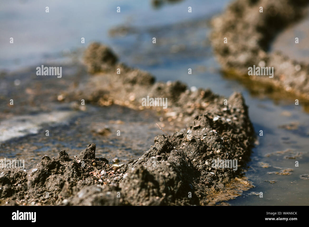 Therapeutic mud clay black for background. healing mud Stock Photo - Alamy