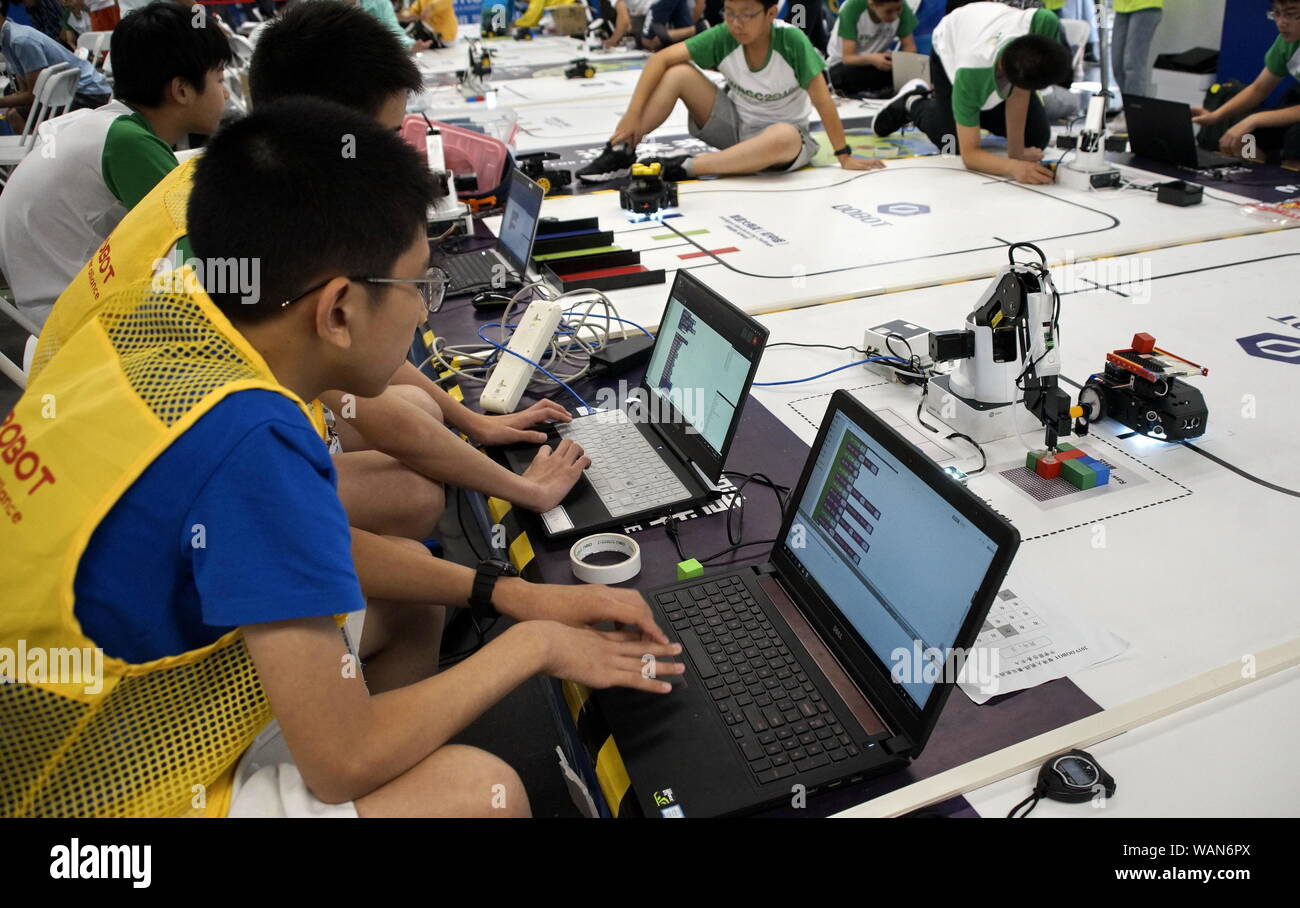 Beijing, China. 21st Aug, 2019. Contestants compete at the World Robot ...
