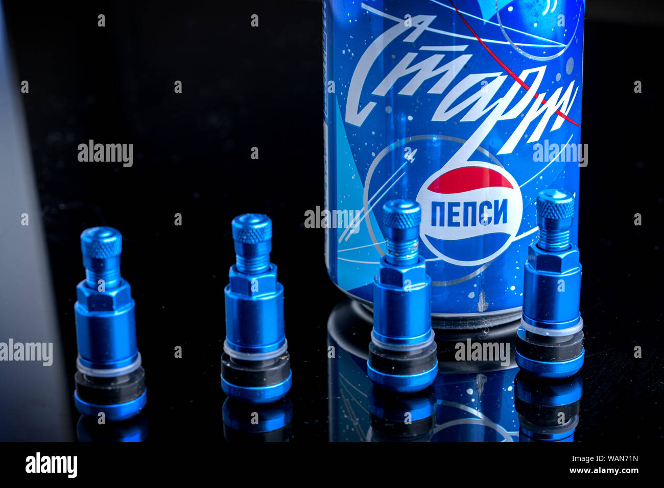 Consumables for tire repair, new blue nipples for car tires and a can ...