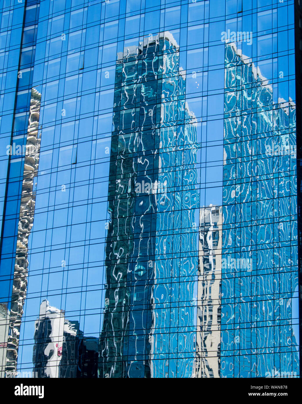 Skyscrapers Reflected in Glass Windows Stock Photo - Alamy