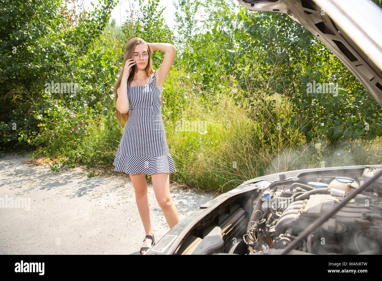 Woman car broke down hi-res stock photography and images - Alamy