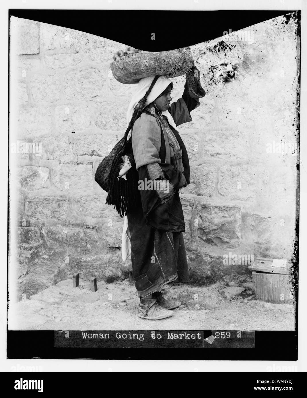 Costumes, characters and ceremonies, etc. Woman going to market Stock ...