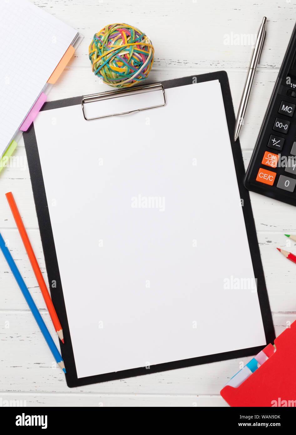 Office workplace table with blank a4 page and supplies. Flat lay. Top ...