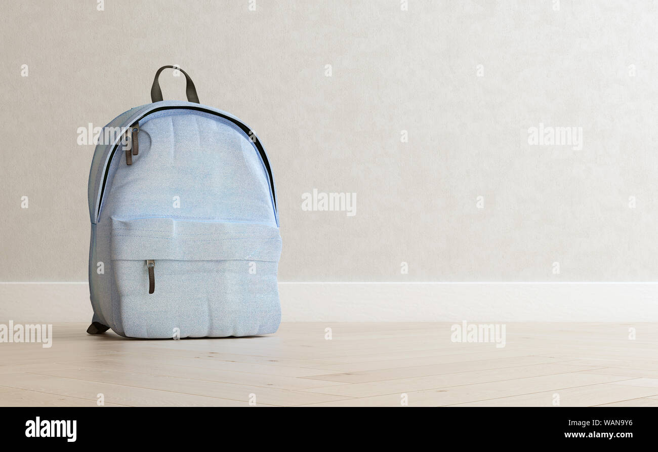 Realistic baby blue backpack on the wooden floor and light beige wall ...