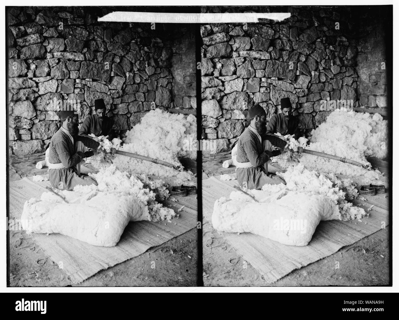 Costumes, characters, etc. Jews carding cotton Stock Photo - Alamy