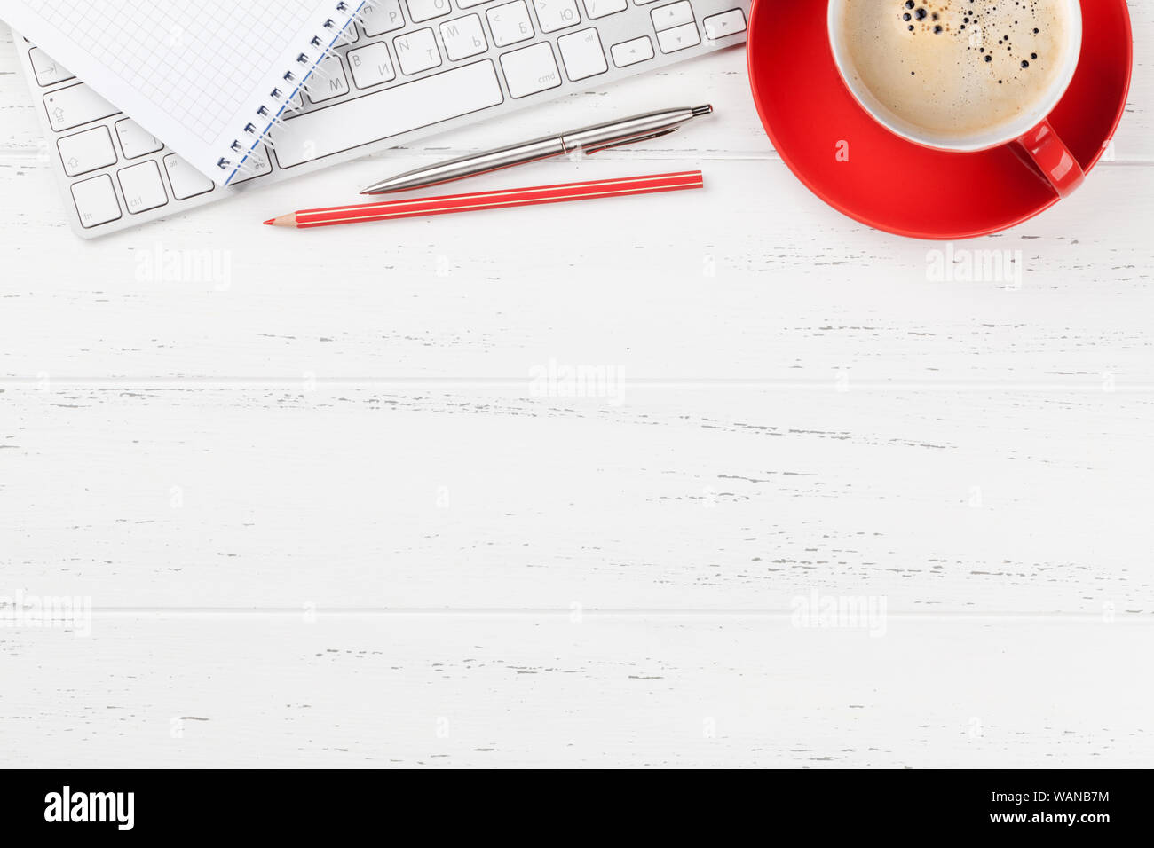 Office workplace table with coffee cup, supplies and computer. Flat lay ...