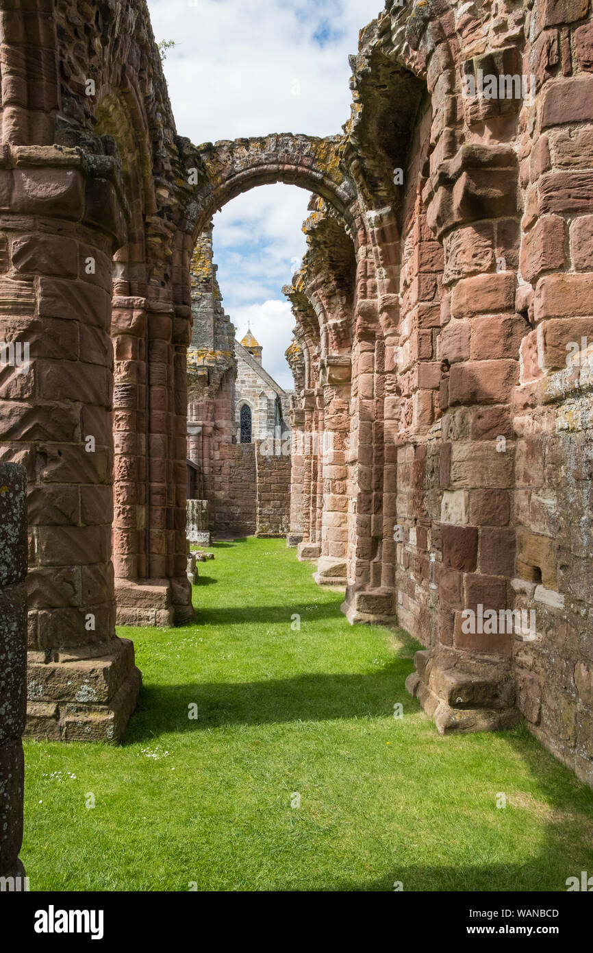 The ruins of Lindisfarne Priory on The Holy Island of Lindisfarne in ...