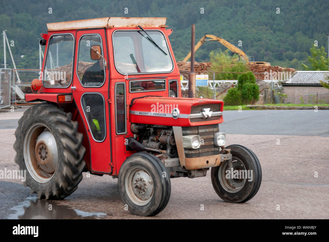 Man Driving 1978 Vintage Faded Red Rusty White Massey Ferguson 135 ...