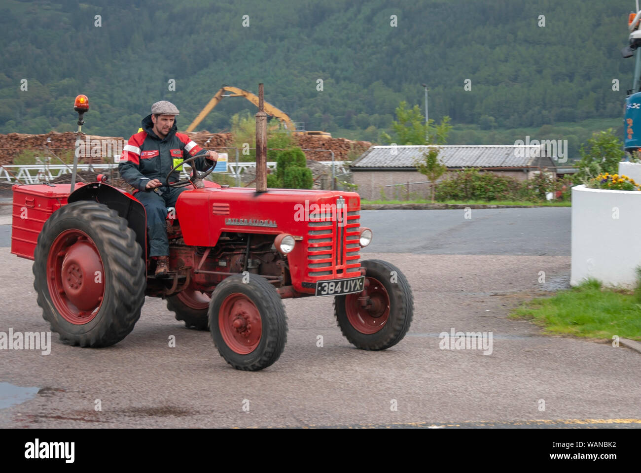 Man Driving 1958 Vintage Red McCormick International Tractor male black ...
