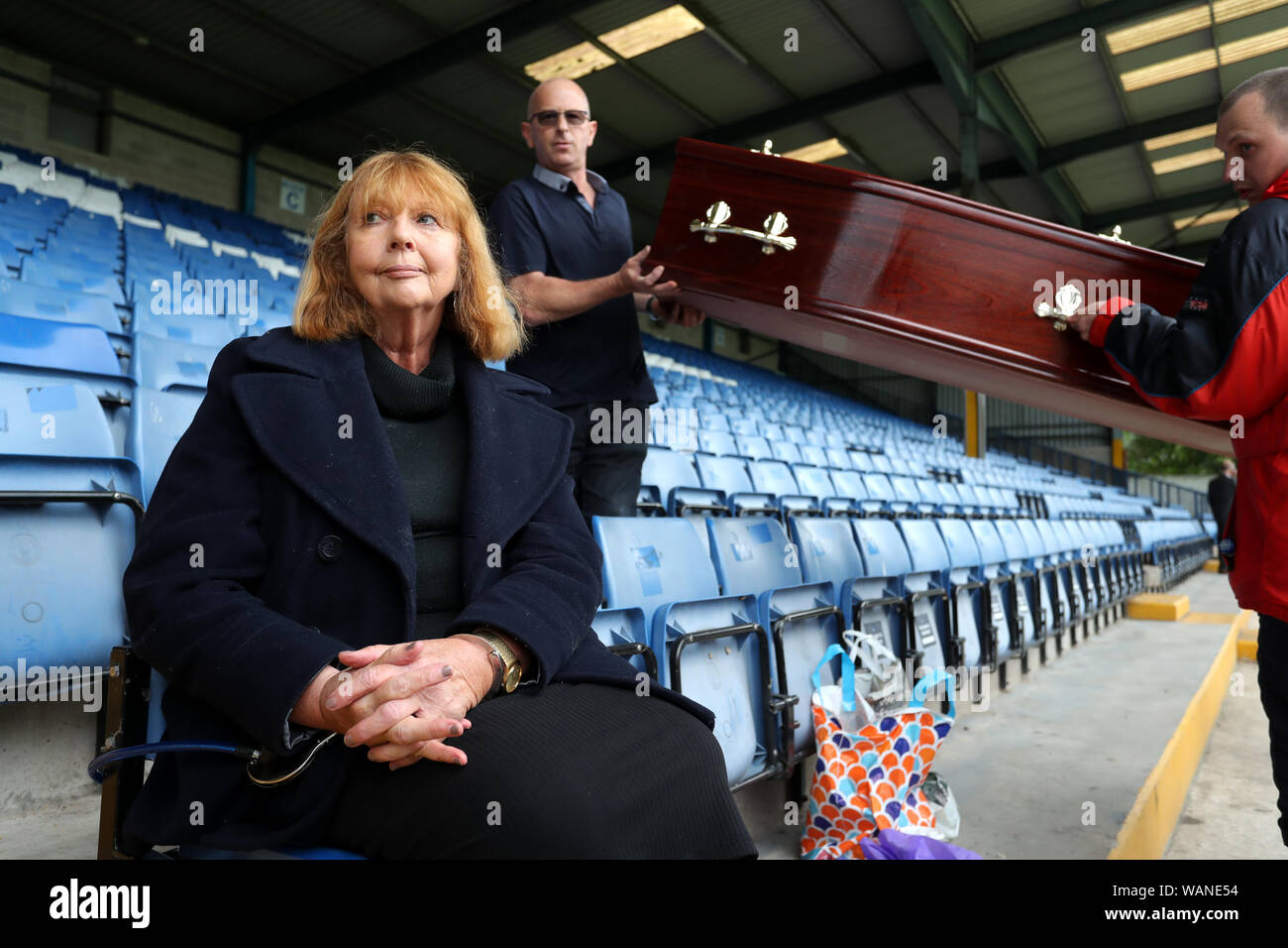 Former director Joy Hart handcuffs herself to a seat inside Gigg Lane ...