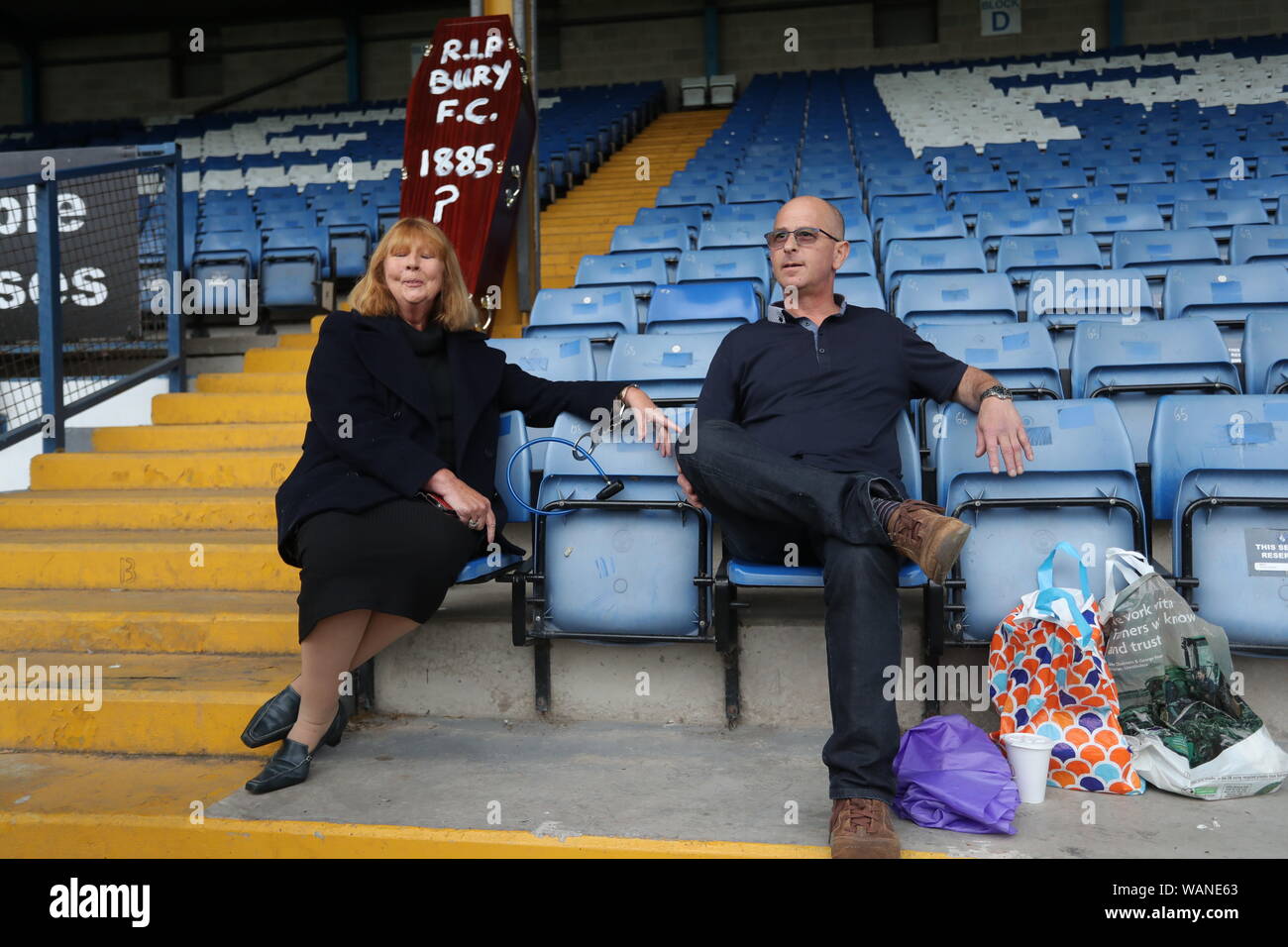 Former director Joy Hart handcuffs herself to a seat inside Gigg Lane ...
