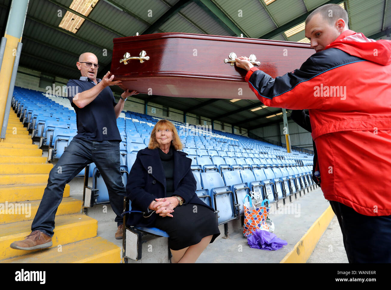 Former director Joy Hart handcuffs herself to a seat inside Gigg Lane ...