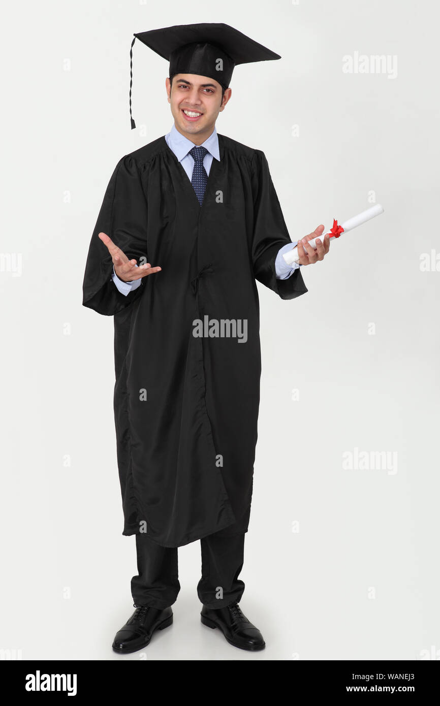 University student holding graduation degree Stock Photo - Alamy