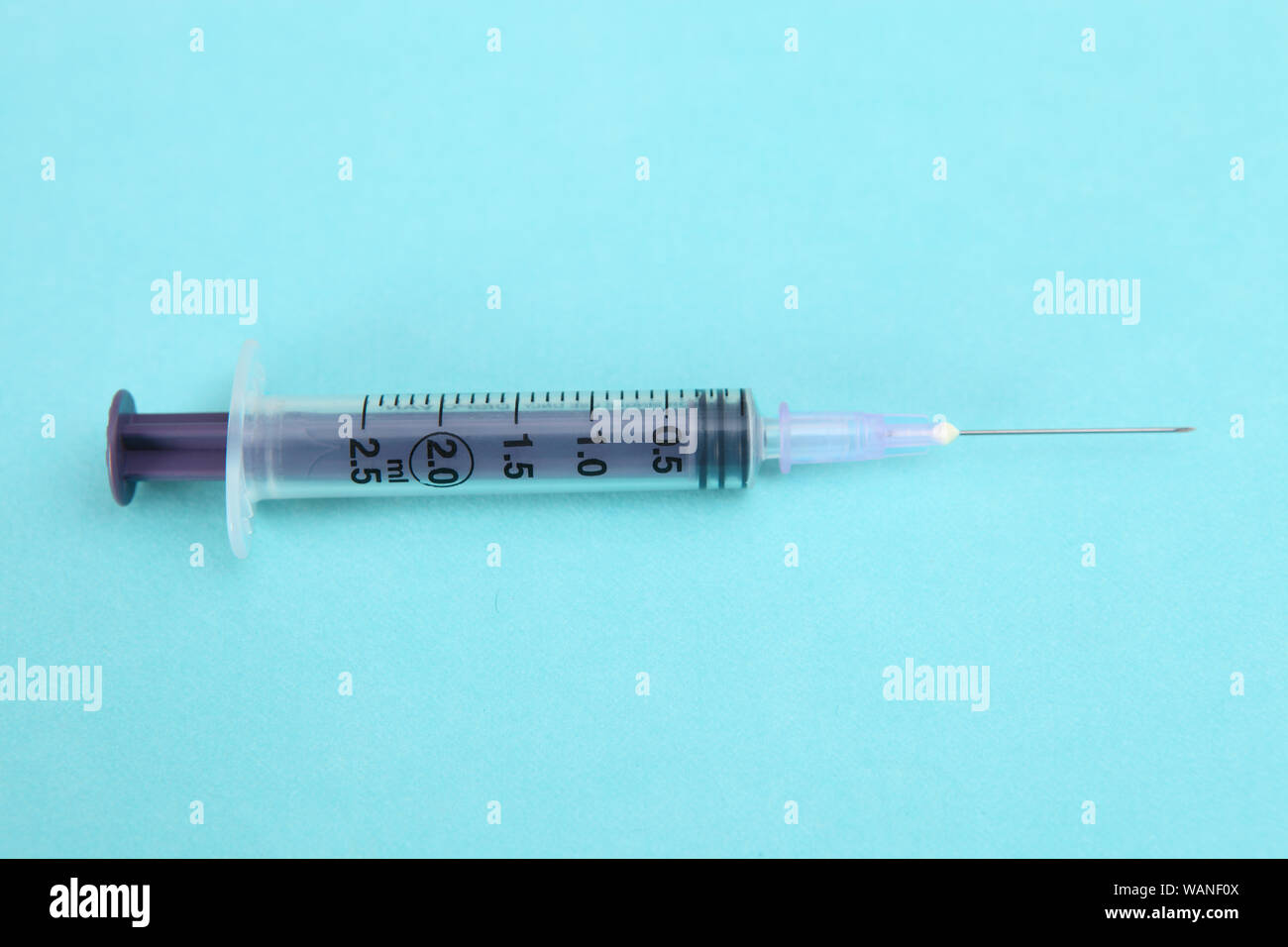 Medical injection isolated on the colored background Stock Photo - Alamy