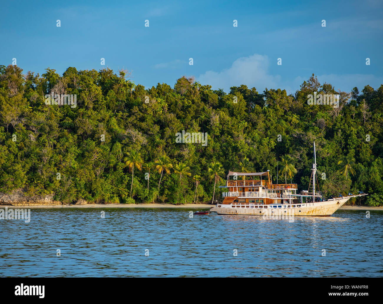 Boat anchored in Raja Ampat / Indonesia Stock Photo - Alamy