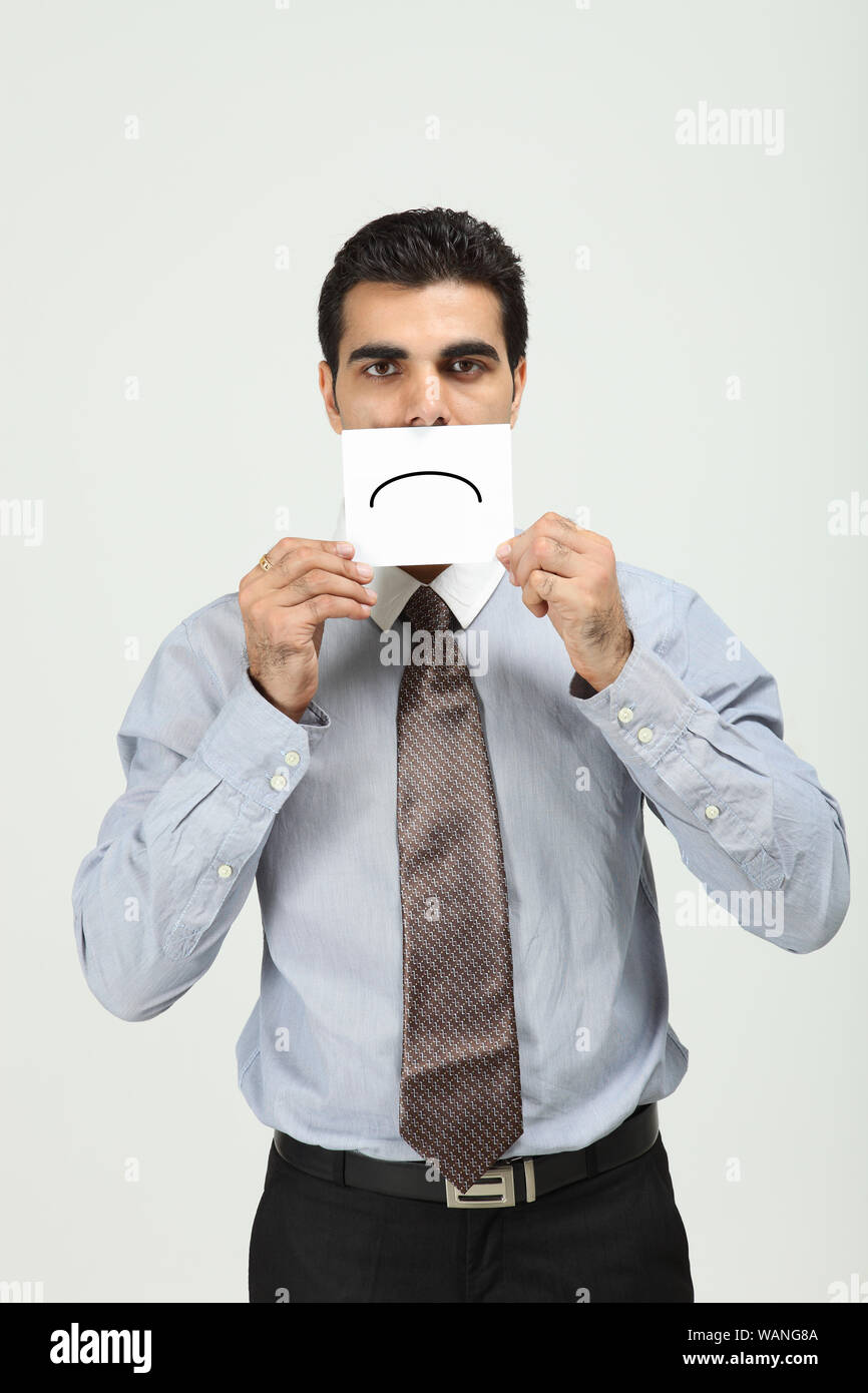 Businessman with a sad face isolated on white background Stock Photo ...