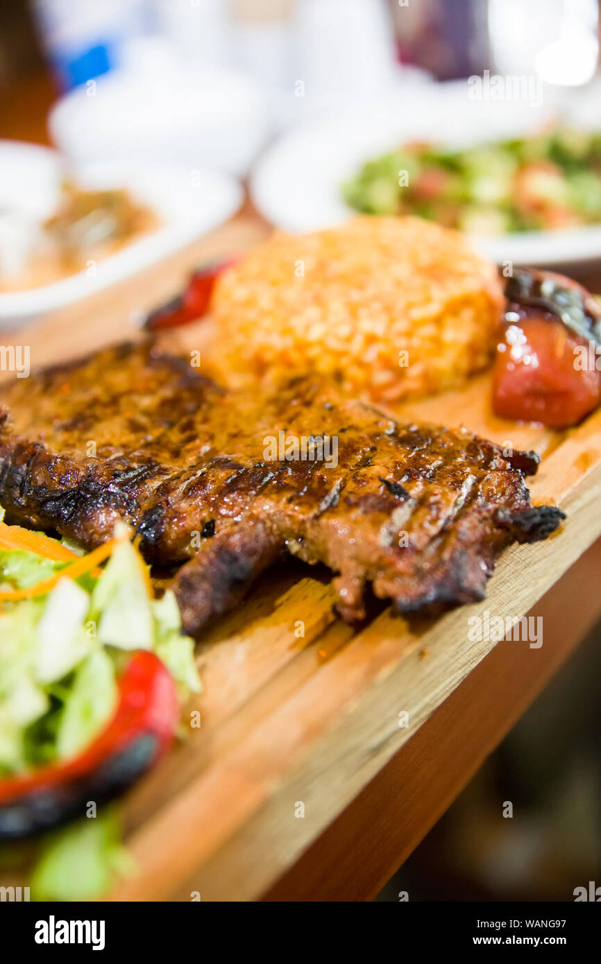 View at fresh prepared grilled beef steak Stock Photo - Alamy
