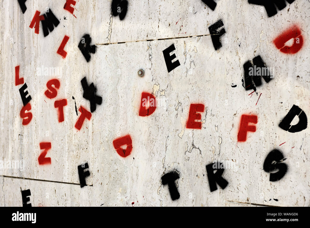 Letters on a wall Stock Photo - Alamy