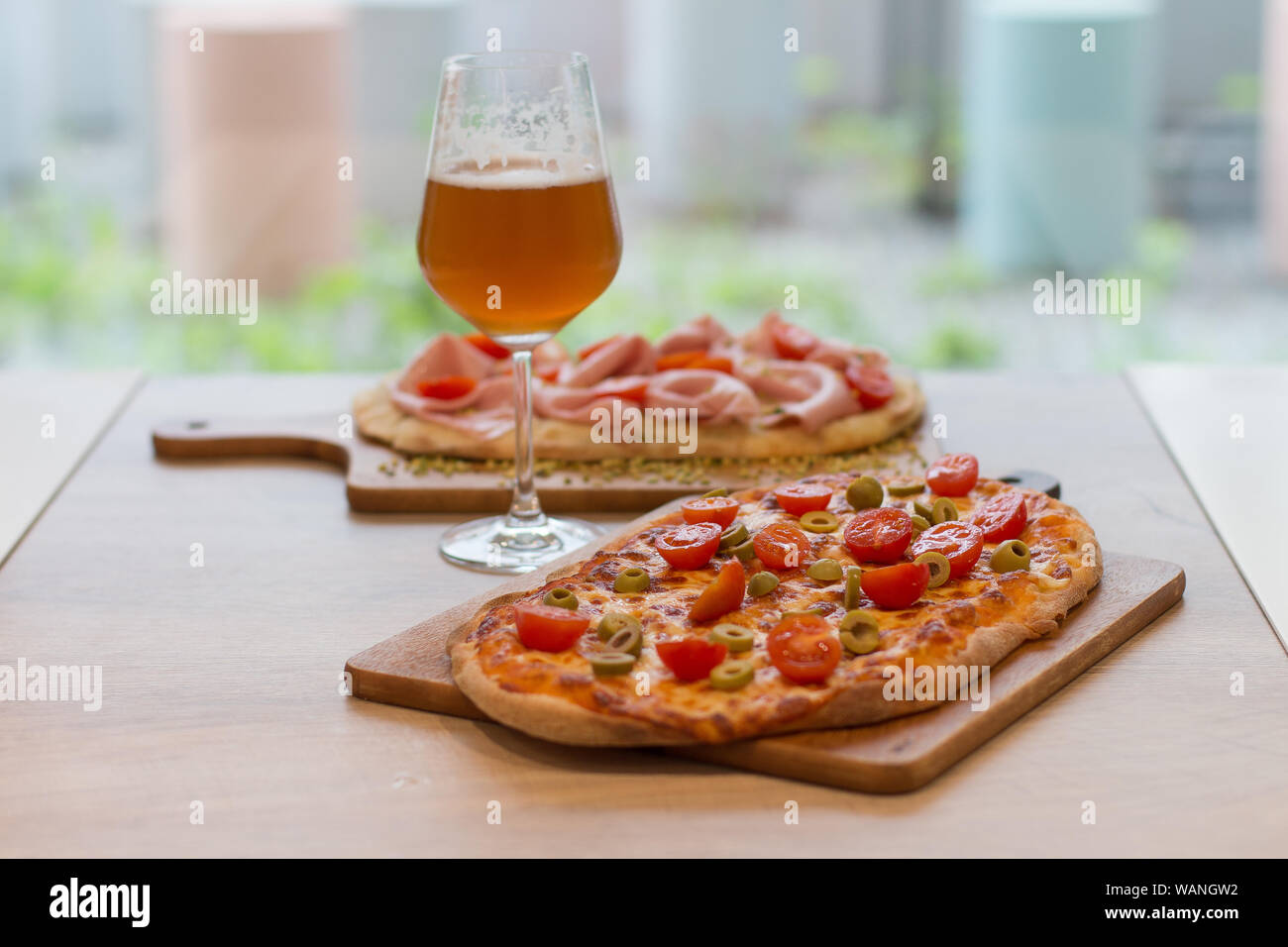 Italian happy hour food detail with pizza and beer glass Stock Photo ...