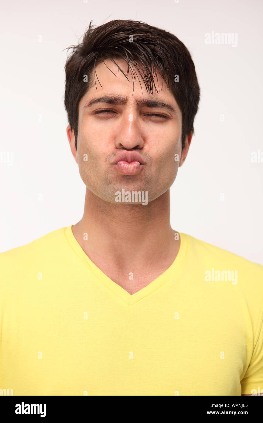Man puckering lips hi-res stock photography and images - Alamy
