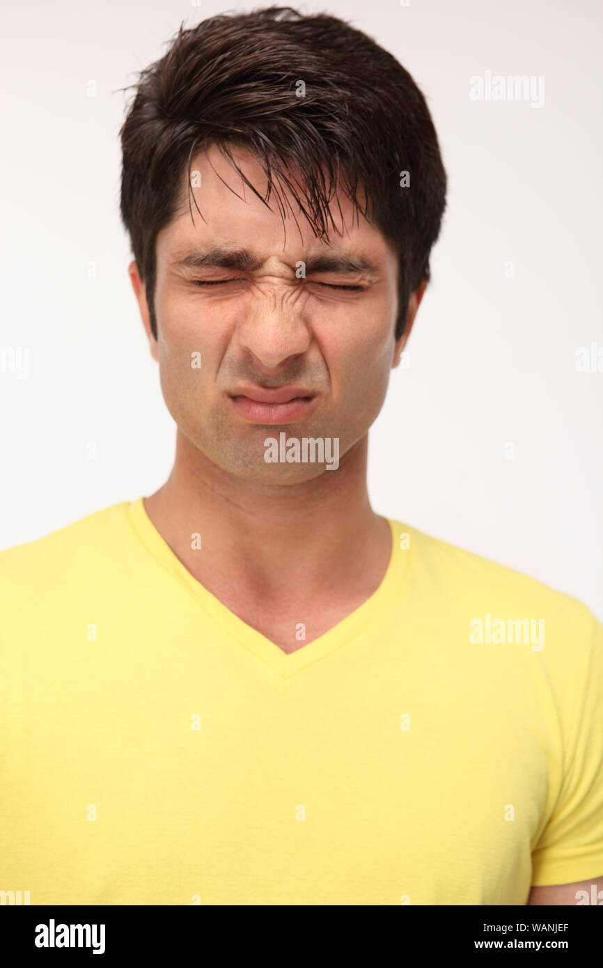 Young man looking frustrate Stock Photo - Alamy