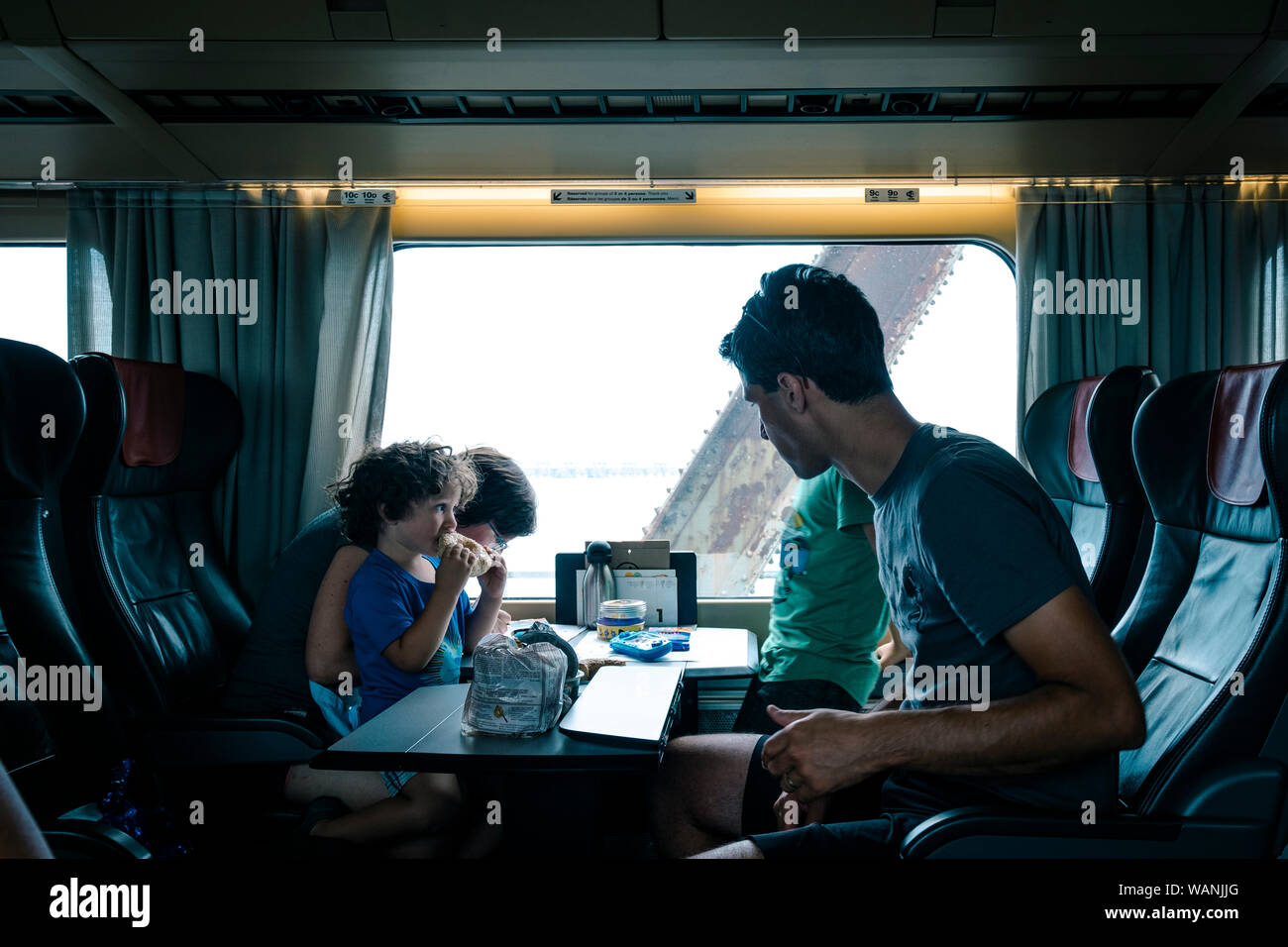 Family on train trip hi-res stock photography and images - Alamy