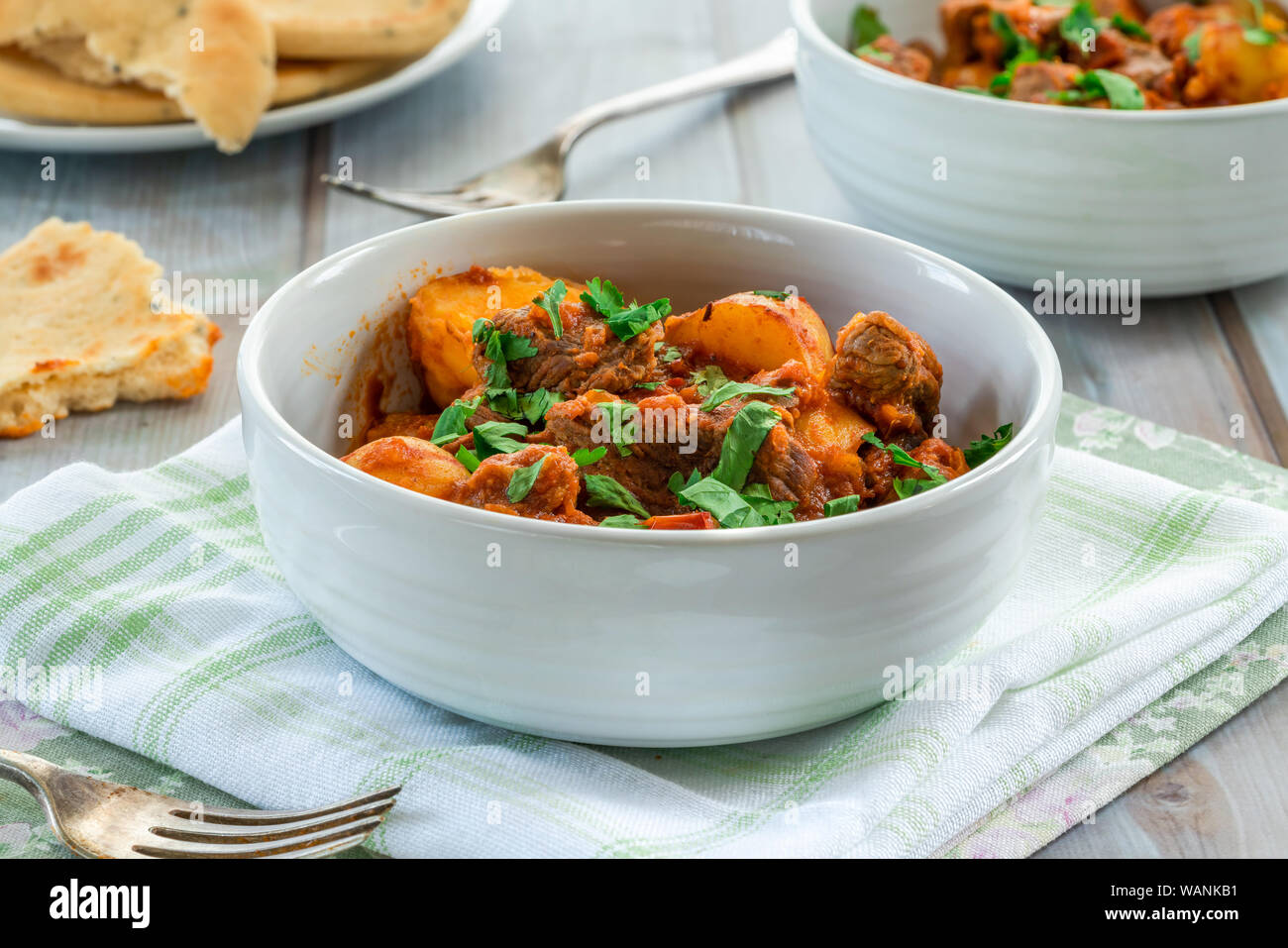 Aloo gosht with naan bread - lamb and potato curry - cuisine popular in ...