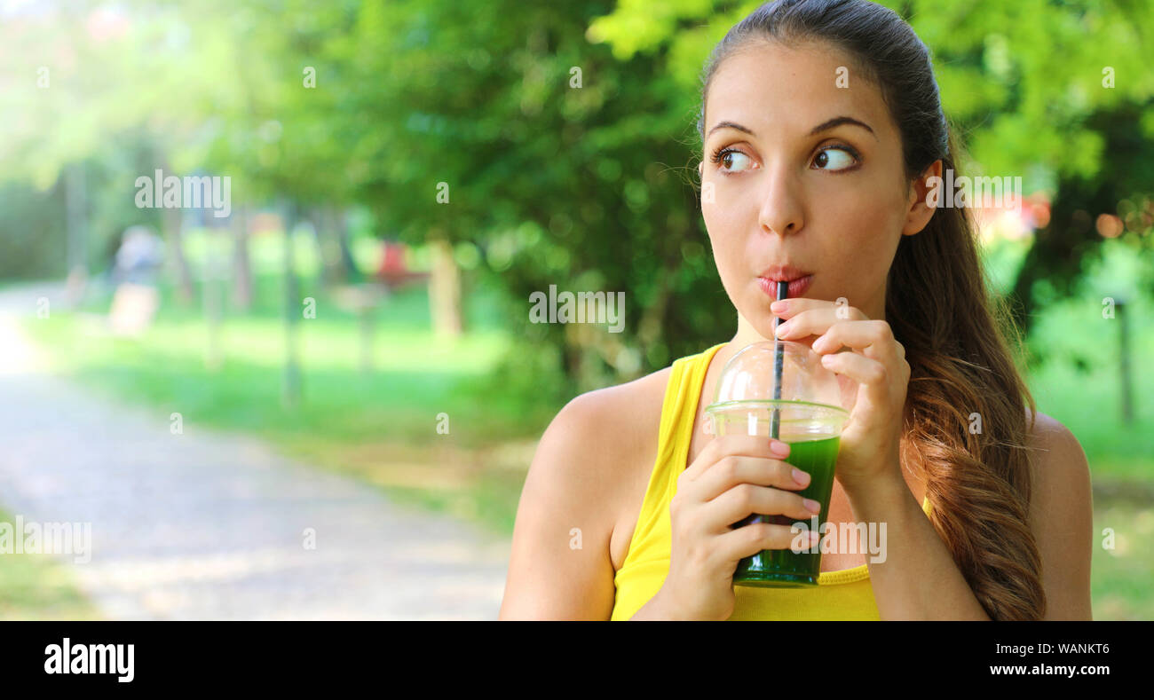 Young Beautiful Woman Drinking Green Detox Smoothie Fitness Girl