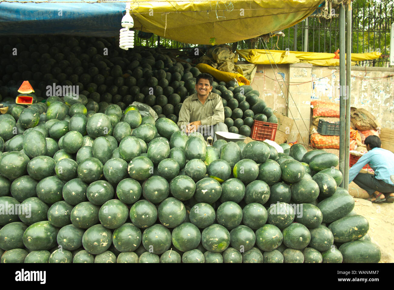 Watermelons sales at a market stall, Gurgaon, Haryana, India Stock ...