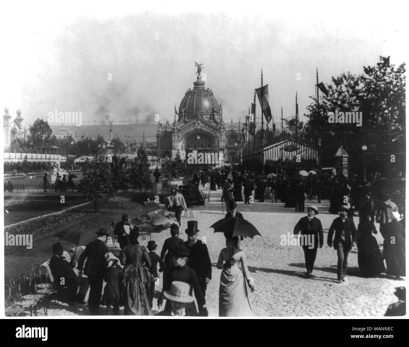 Crowd of people along parterre beside illuminated fountains, view ...