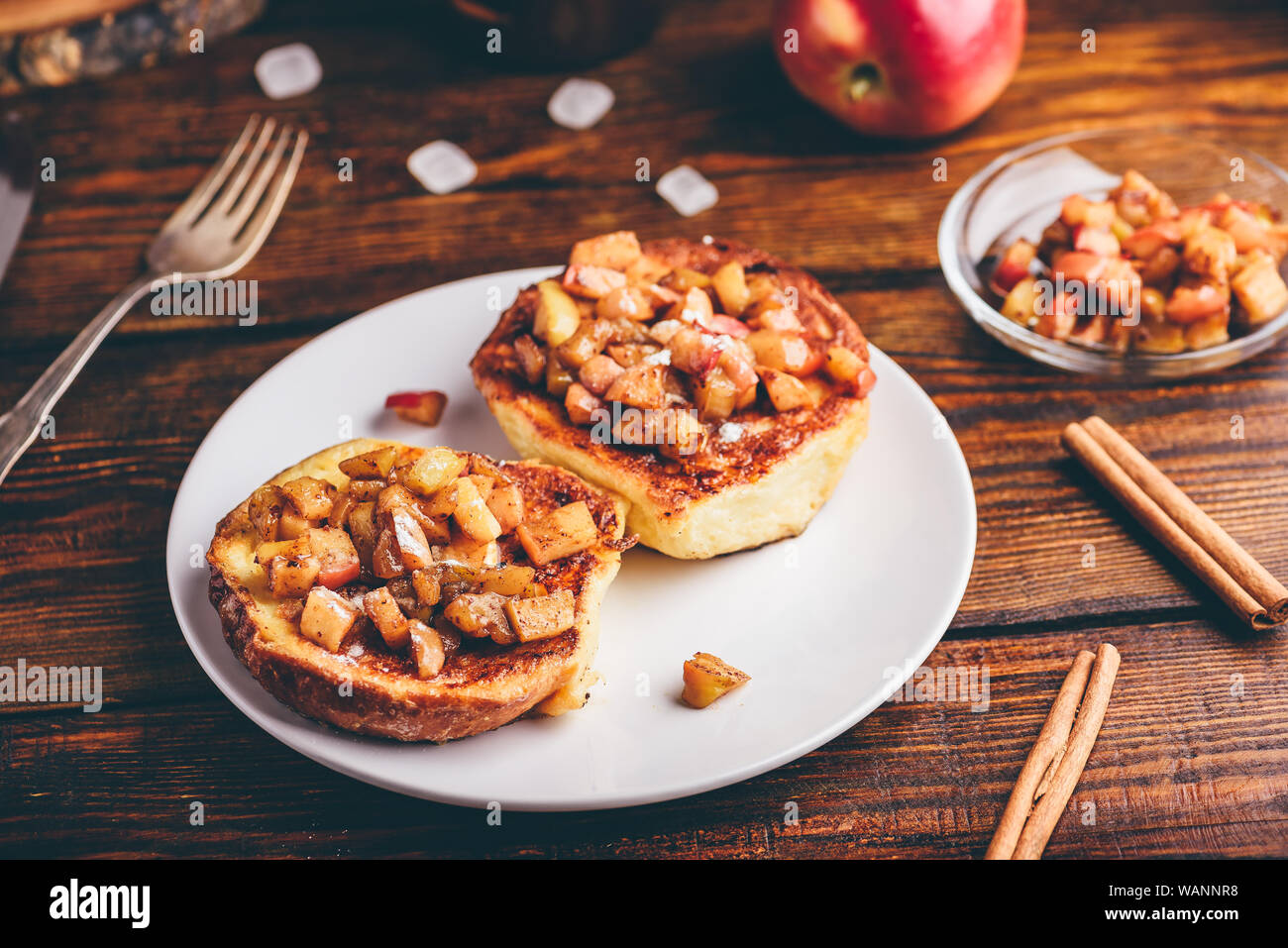 French toasts with chopped apple caramelized with cinnamon Stock Photo ...