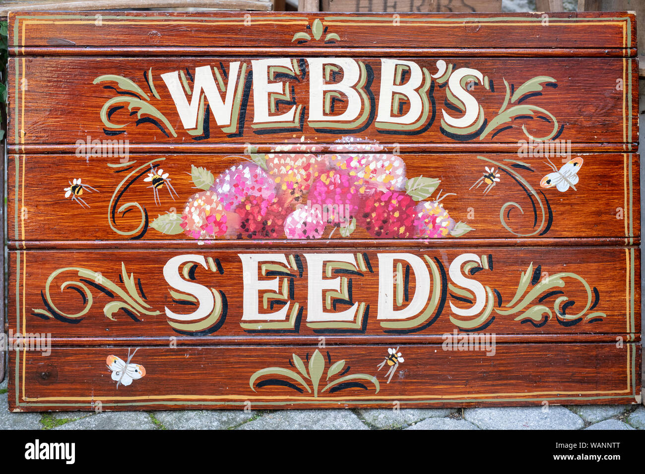 Vintage hand painted wooden seed sign outside a shop in Stow on the ...