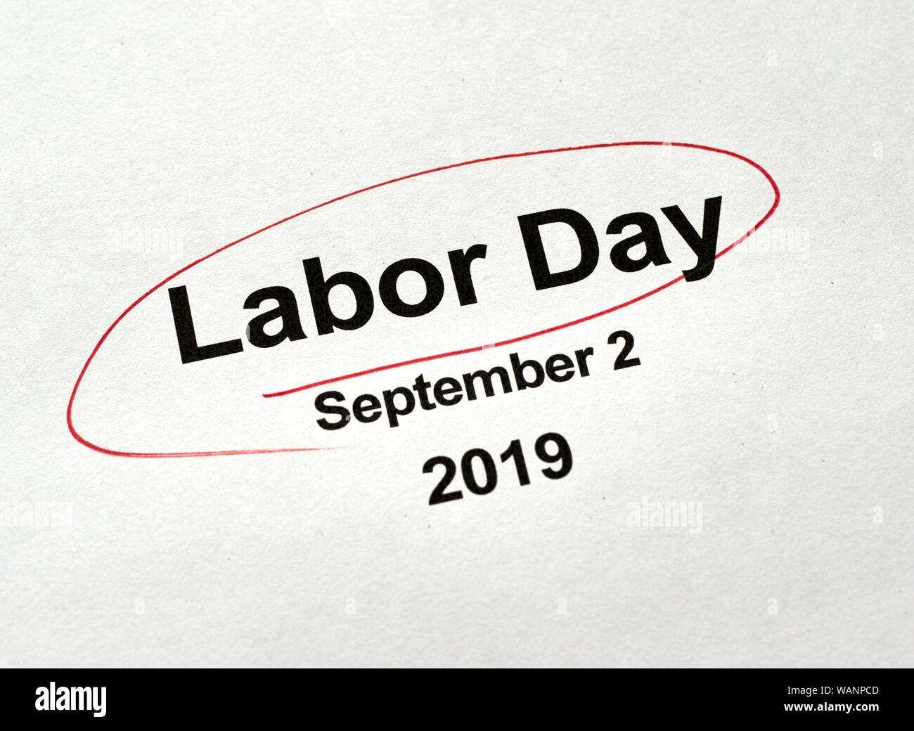 Labor Day writing printed on a white background Stock Photo - Alamy