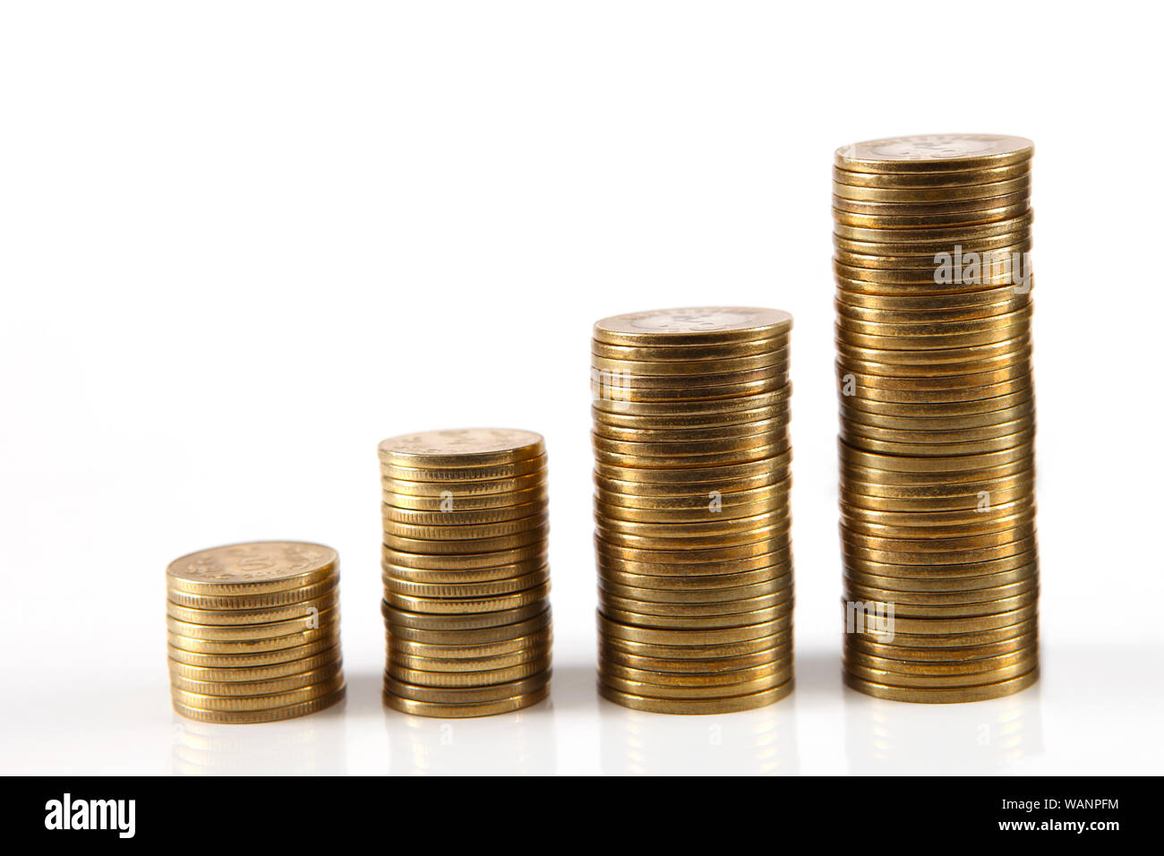 Four rows of stack of golden coins Stock Photo - Alamy
