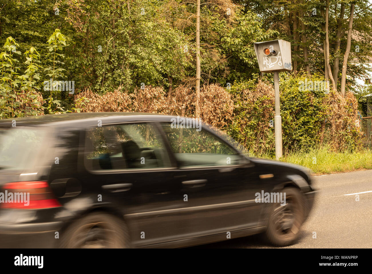 radar speed trap with car in motion Stock Photo - Alamy
