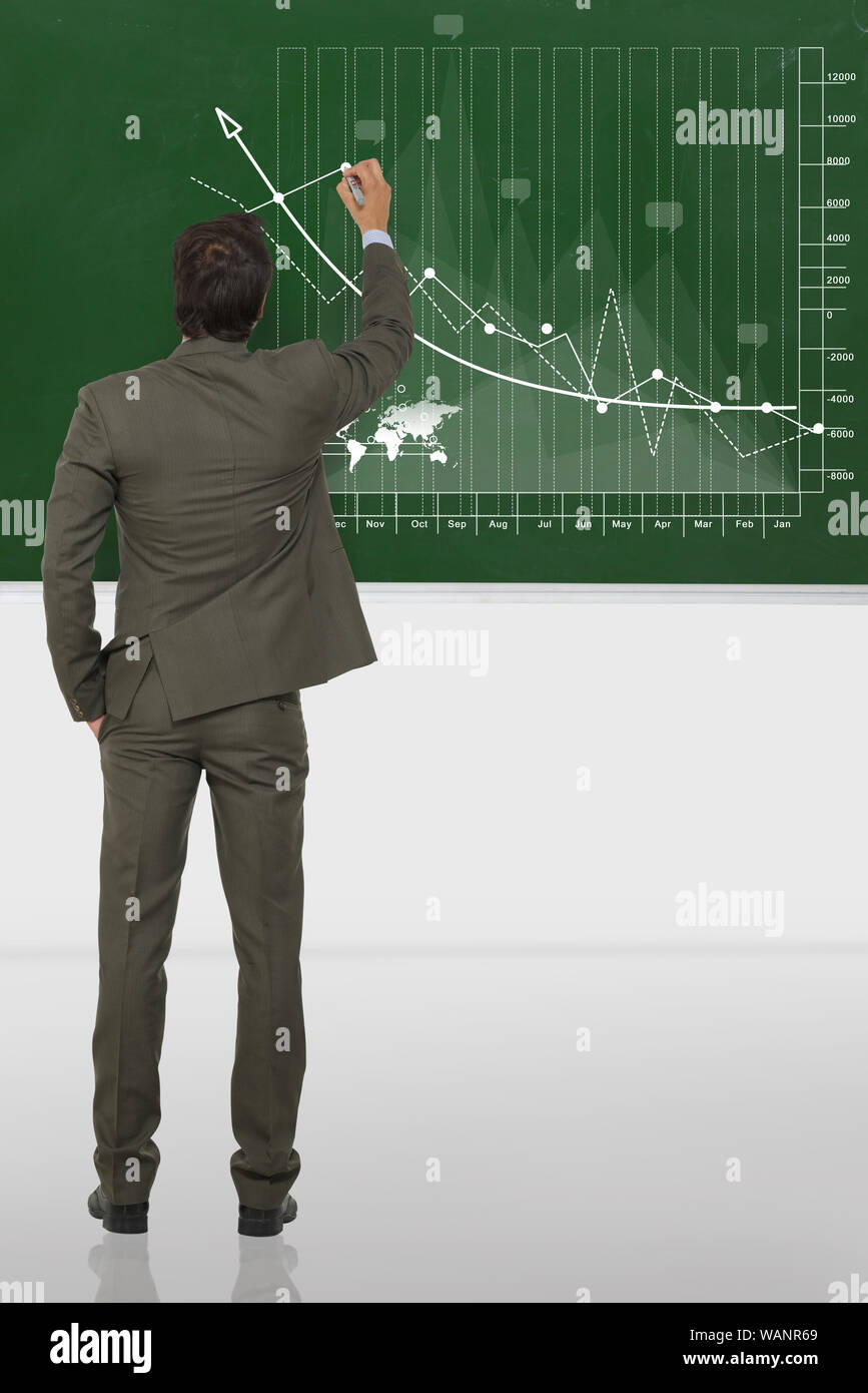 Rear view of a businessman giving a presentation Stock Photo - Alamy