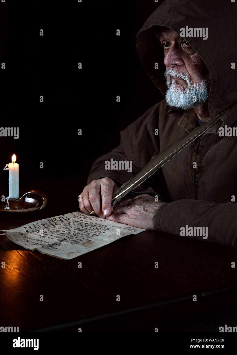 Writing monk bible hi-res stock photography and images - Alamy