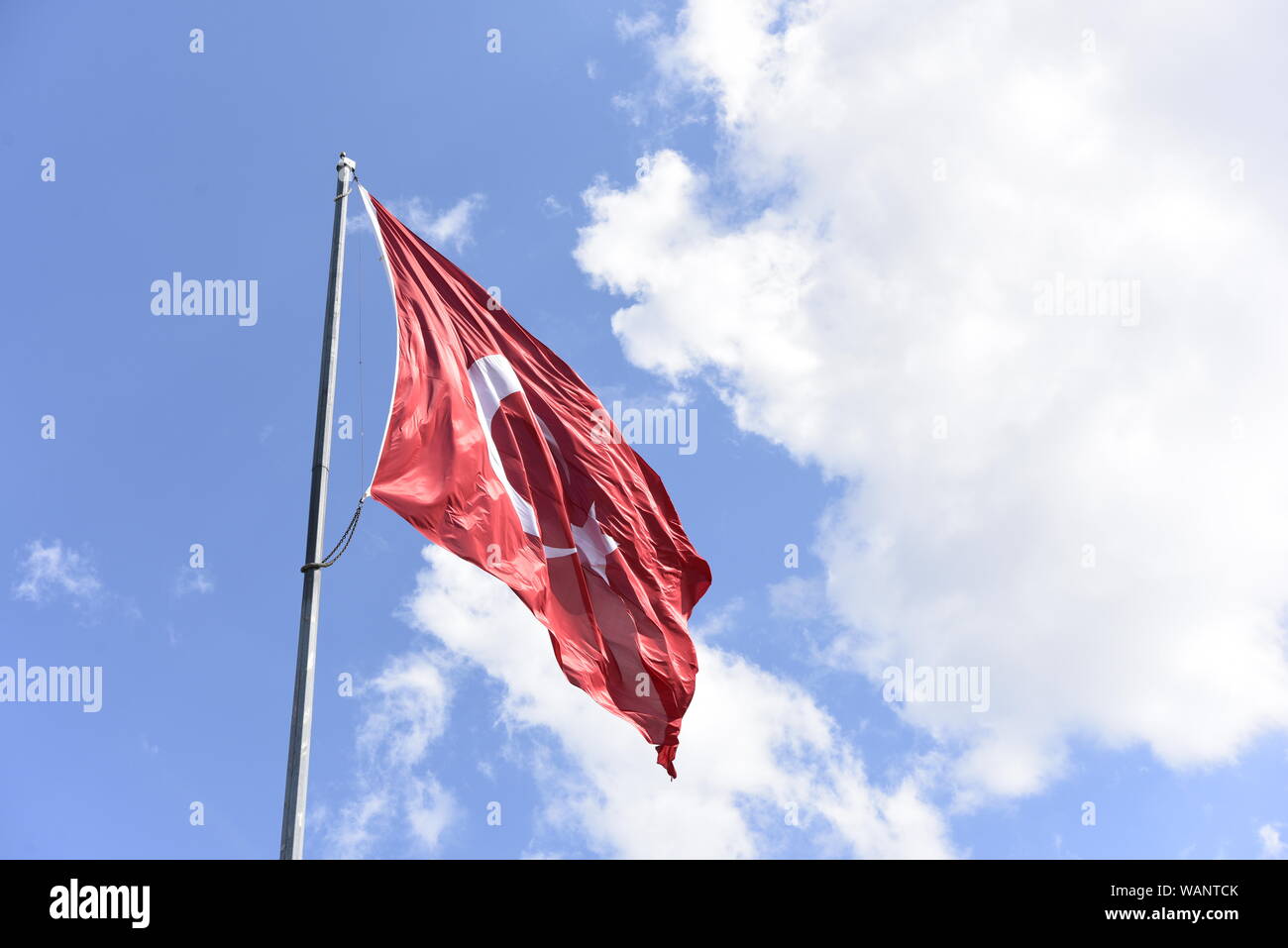 Turkish flag waving in sky Stock Photo - Alamy
