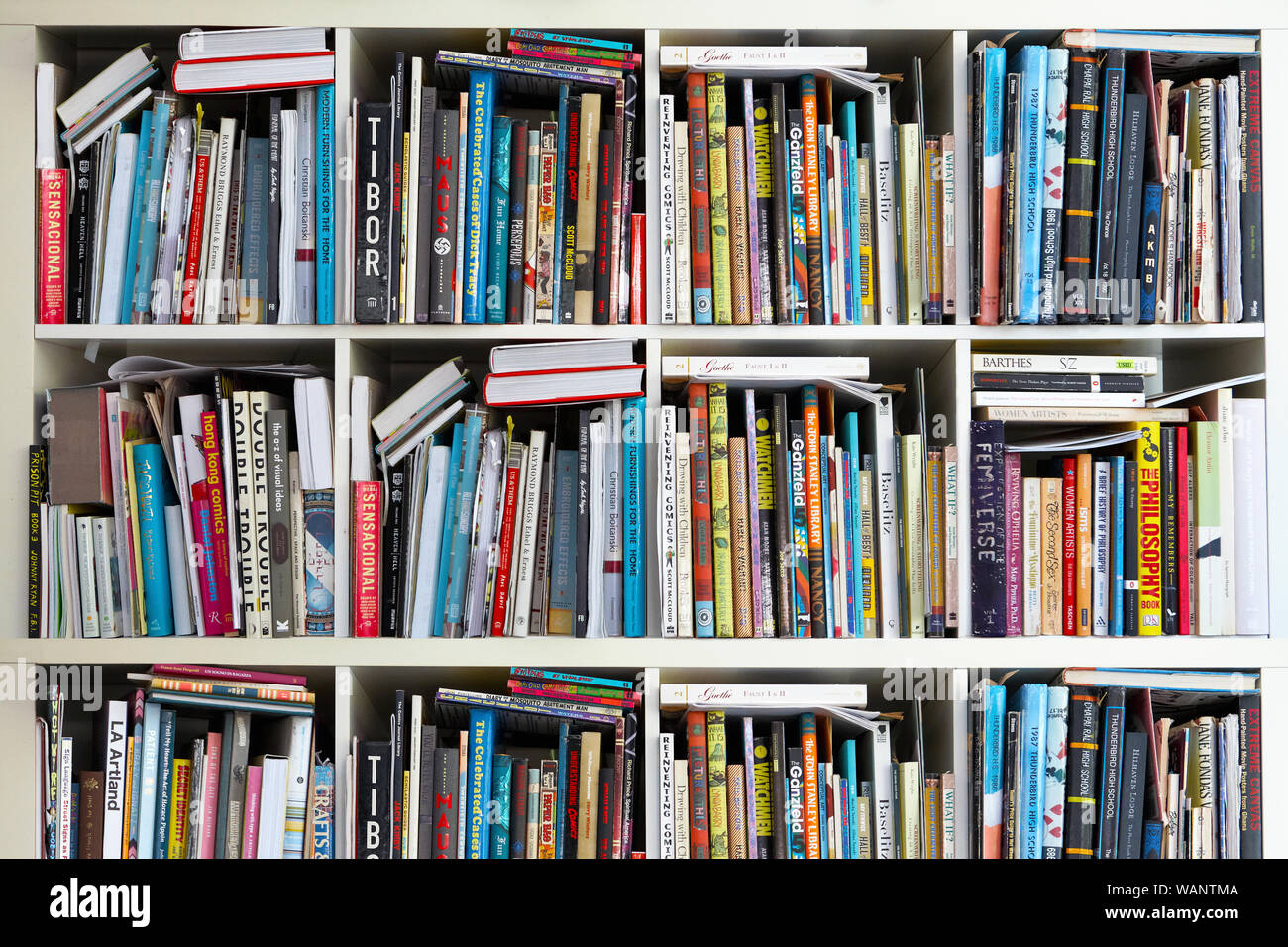 Books arranged in a row Stock Photo - Alamy