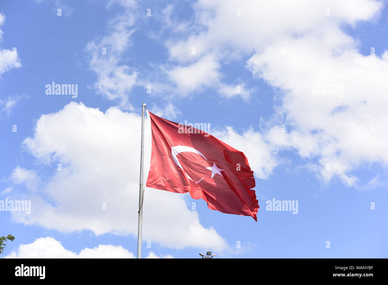 Turkish flag waving in sky Stock Photo - Alamy