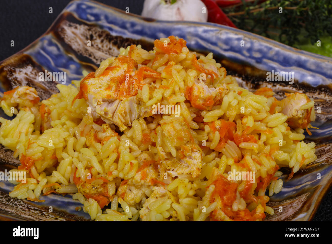 Traditional Pilaf with chicken and carrot served garlic and thyme Stock ...