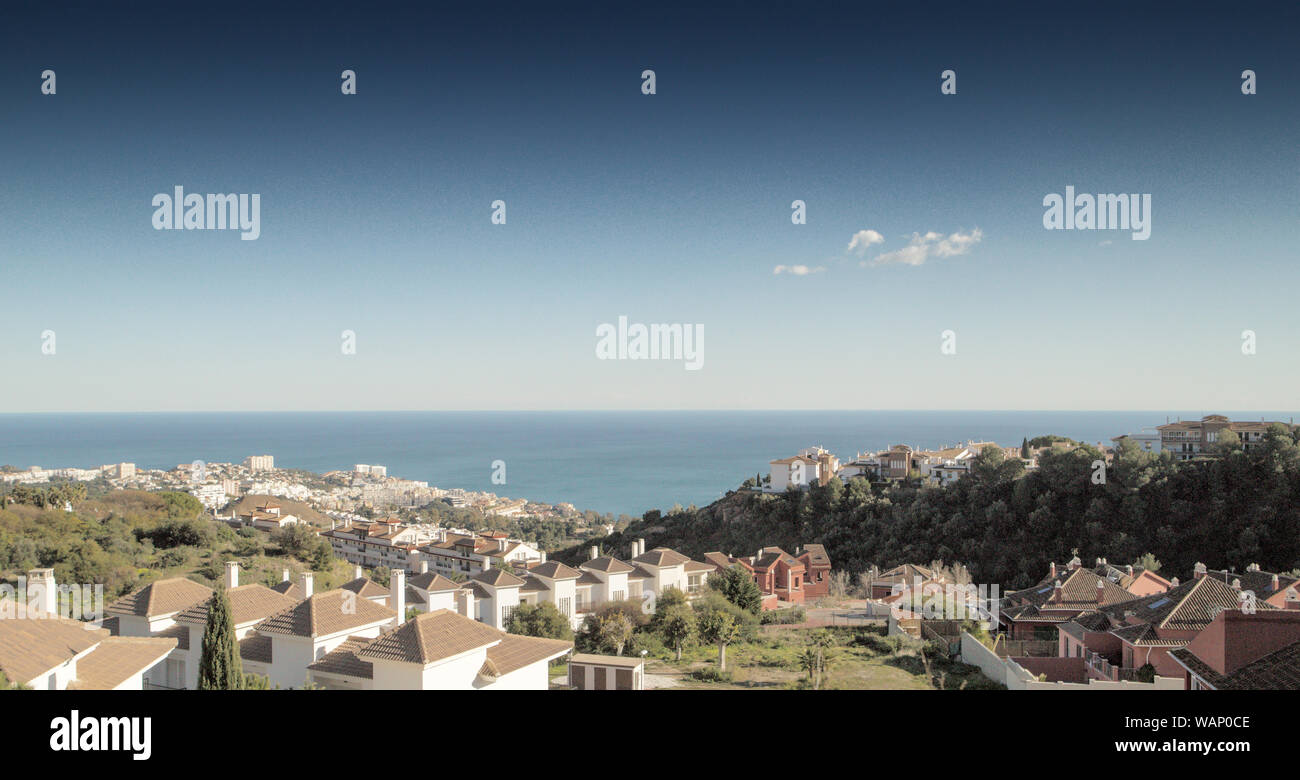 view from the top of a hill looking down at a valley going down to the ...