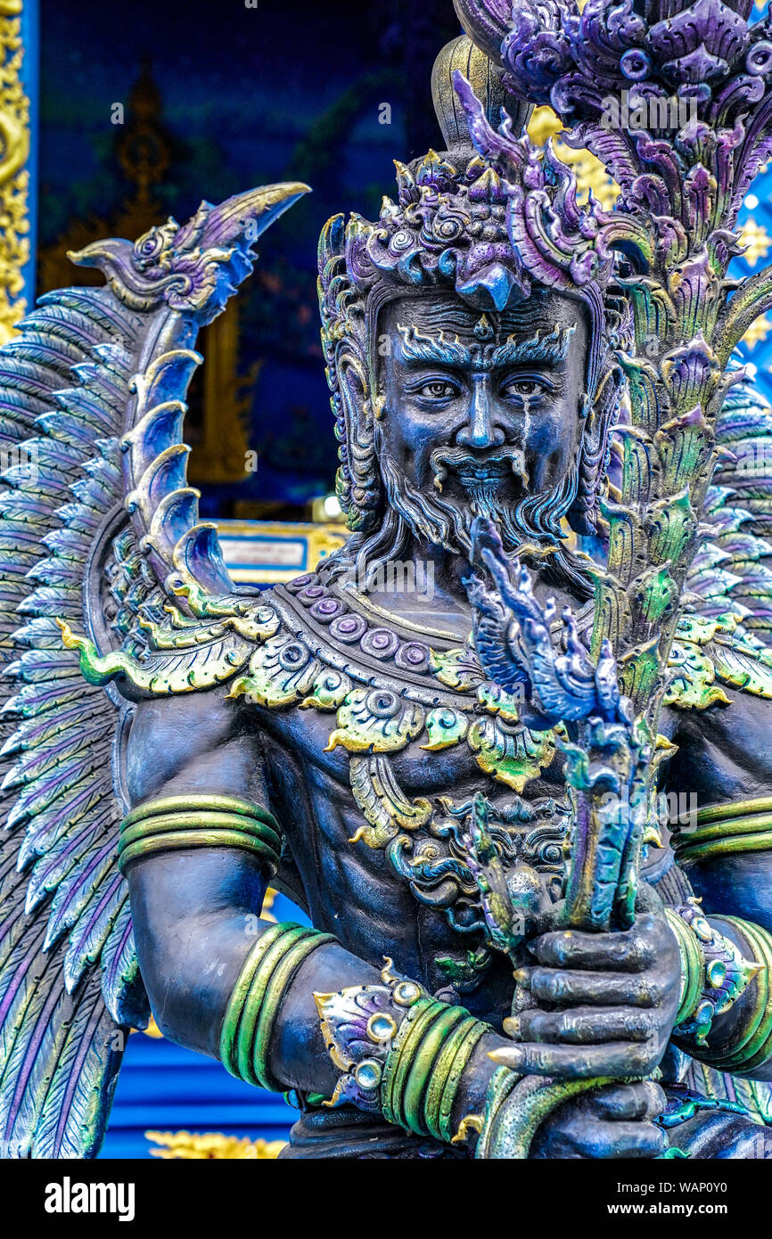 The Blue - Turquiose metalic God statue in Thai blue temple, at the ...