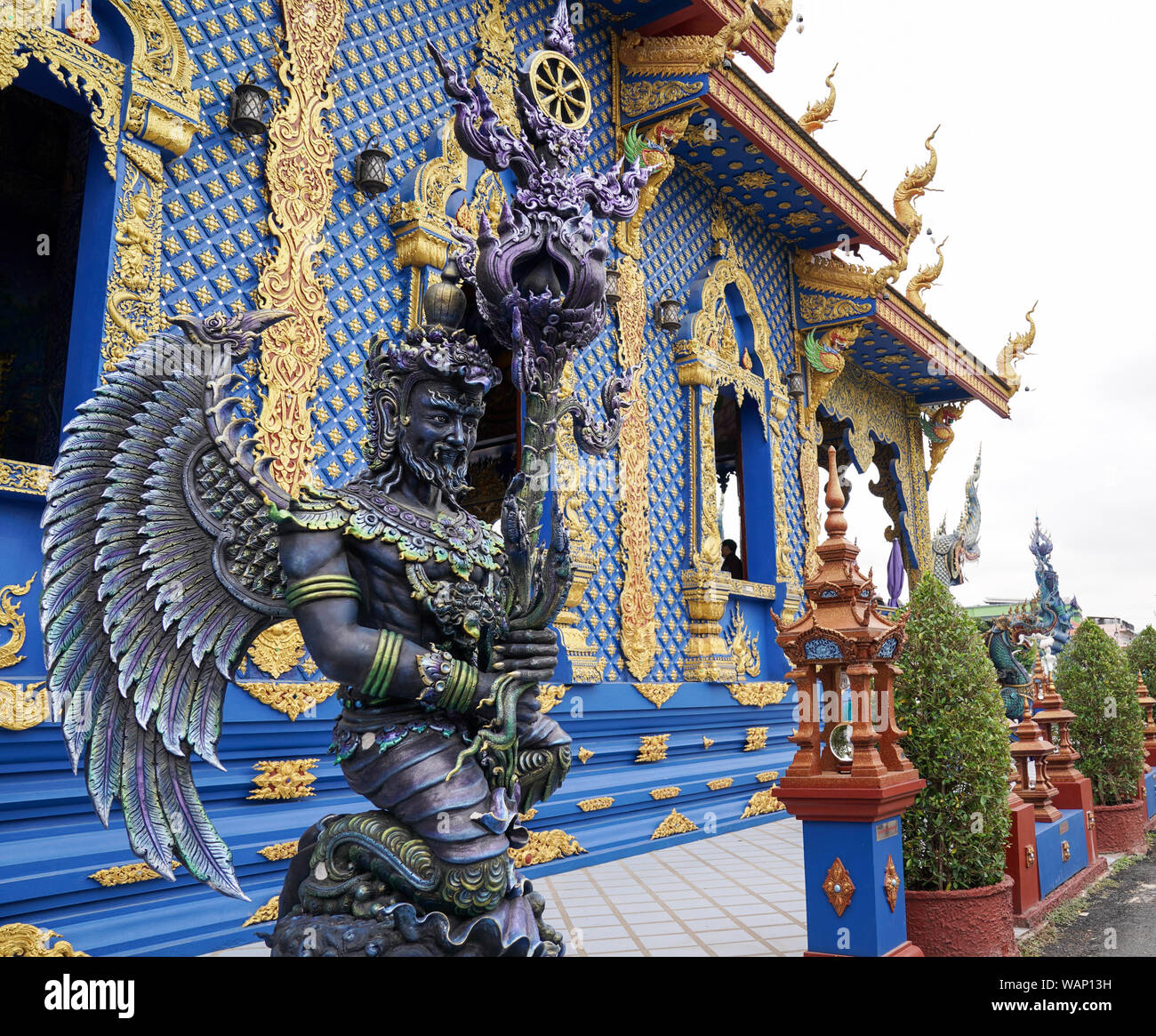 The Blue - Turquiose metalic God statue in Thai blue temple, at the ...